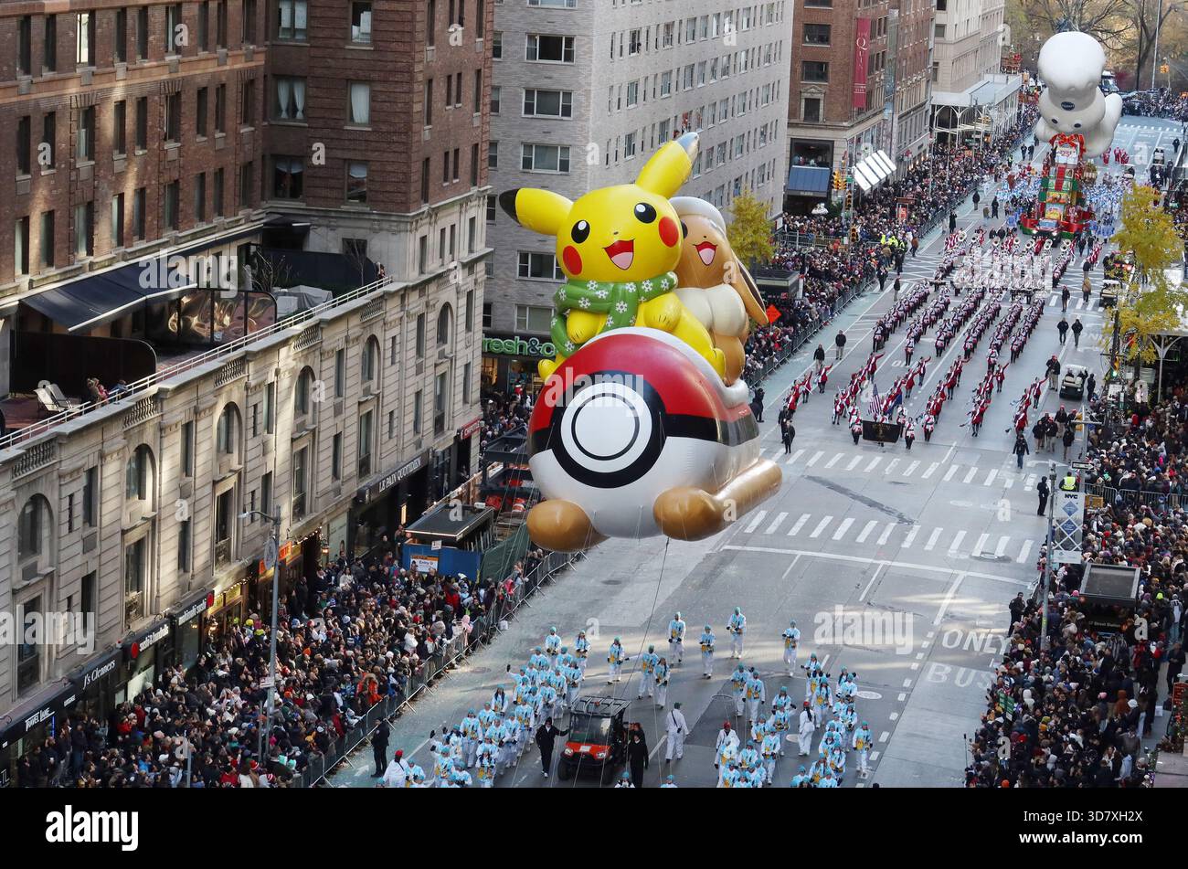 The Pikachu and Eevee balloon makes its way down the parade route as ...