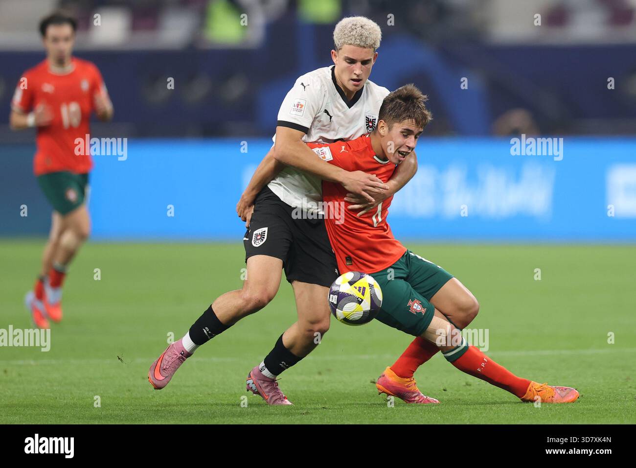 Austria's Nicolas Jozepovic holds Portugal's Rafael Quintas during the ...