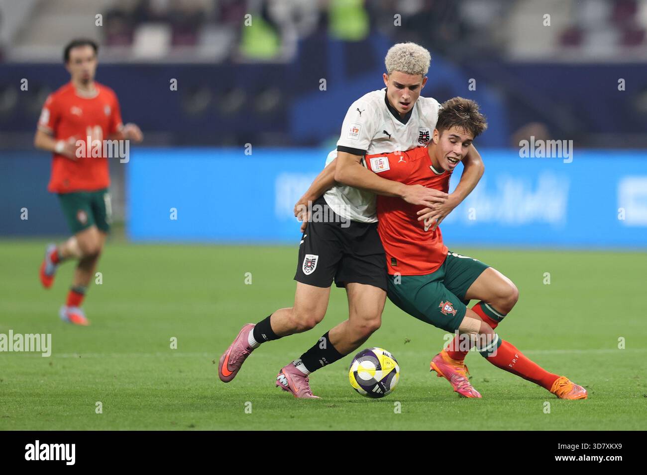 Austria's Nicolas Jozepovic holds Portugal's Rafael Quintas during the ...