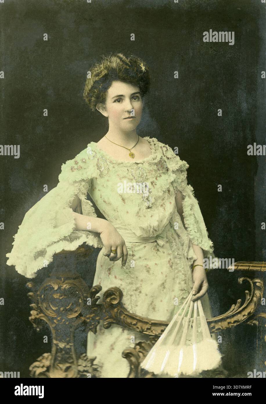 Studio portrait of a lady with fan, 1902 Stock Photo - Alamy