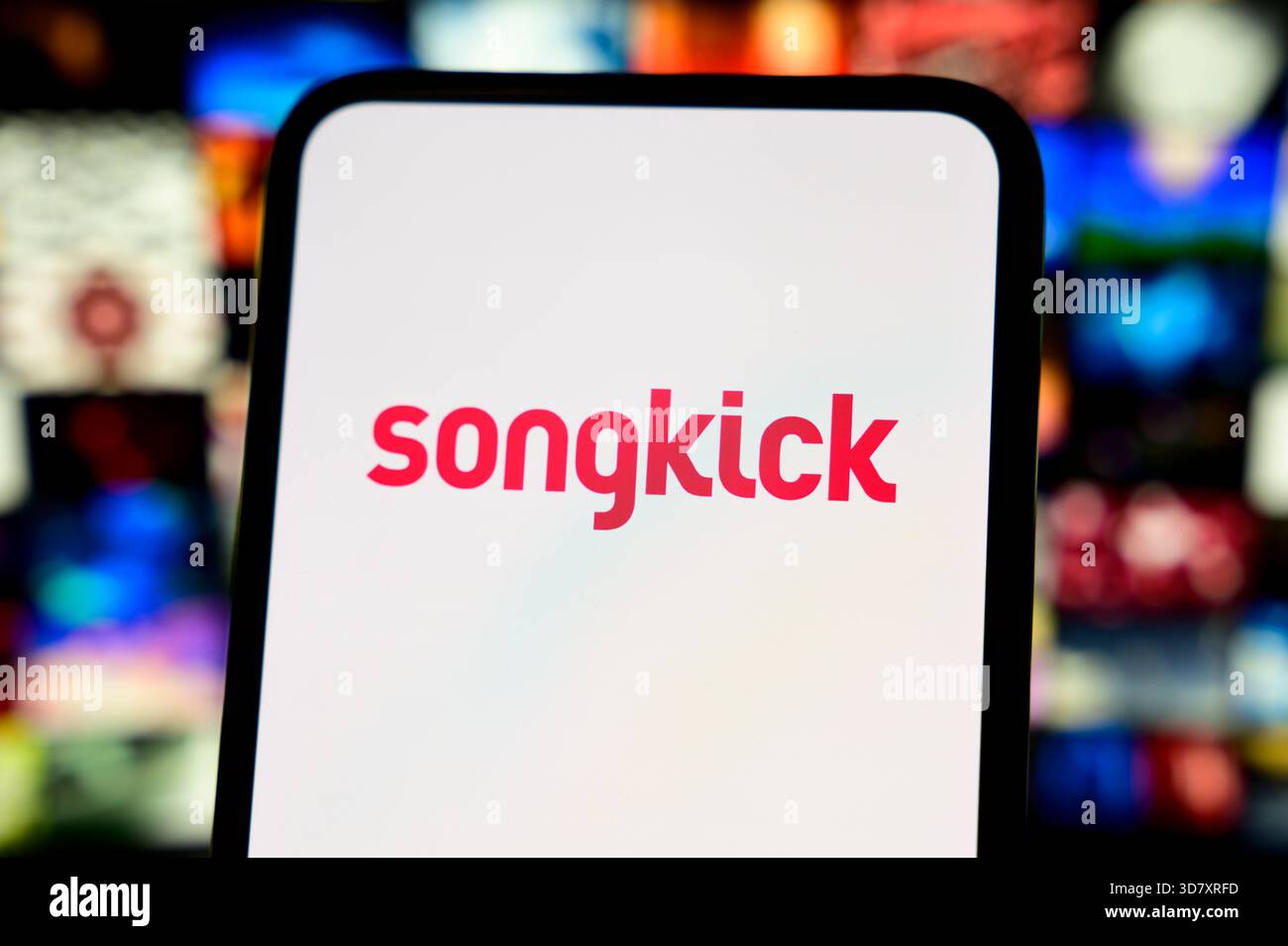 In this photo illustration, the Songkick logo is displayed on a cell ...