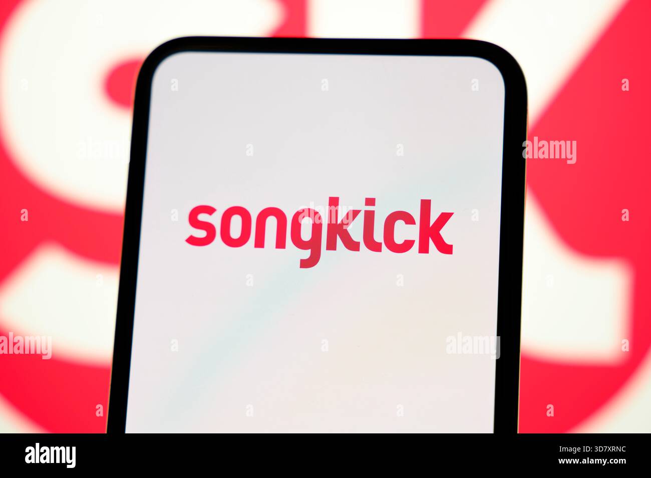 In this photo illustration, the Songkick logo is displayed on a cell ...