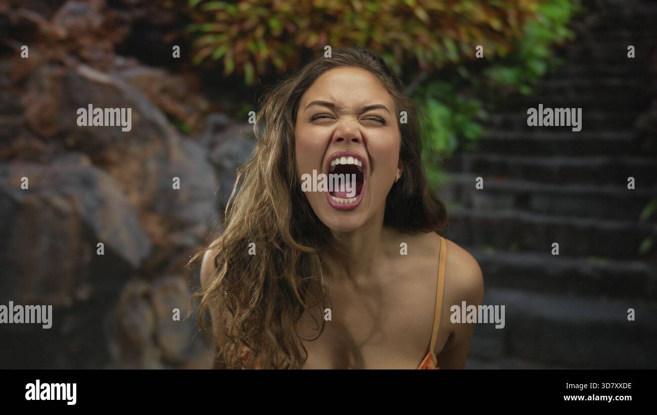 Woman in bikini enthusiastically shouting hi-res stock photography and ...