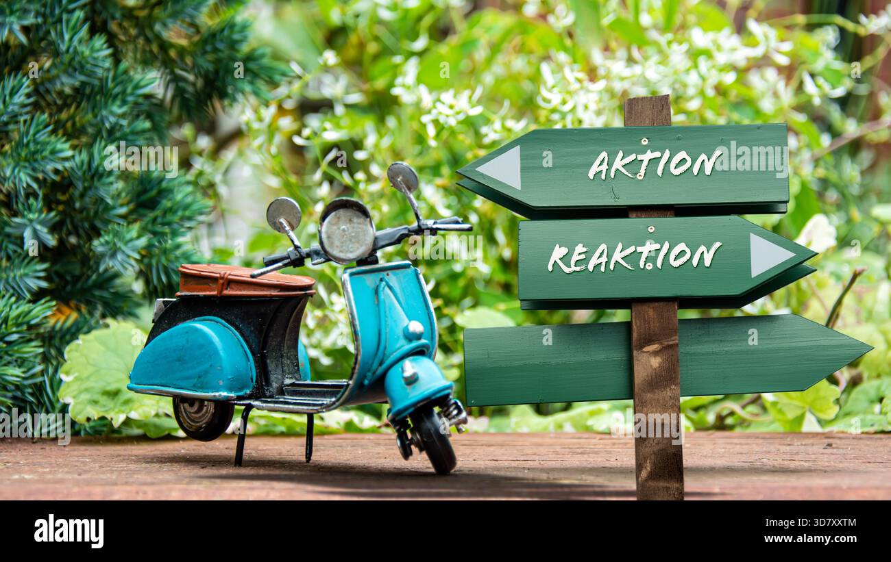 An image with a signpost pointing in two different directions in German ...