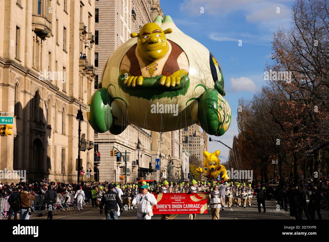 The Shrek's Onion Carriage balloon floats down Central Park West during ...