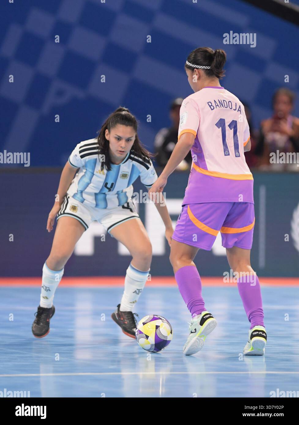 Lara Belen Villalba (L) of Argentina Women Futsal team look on as ...