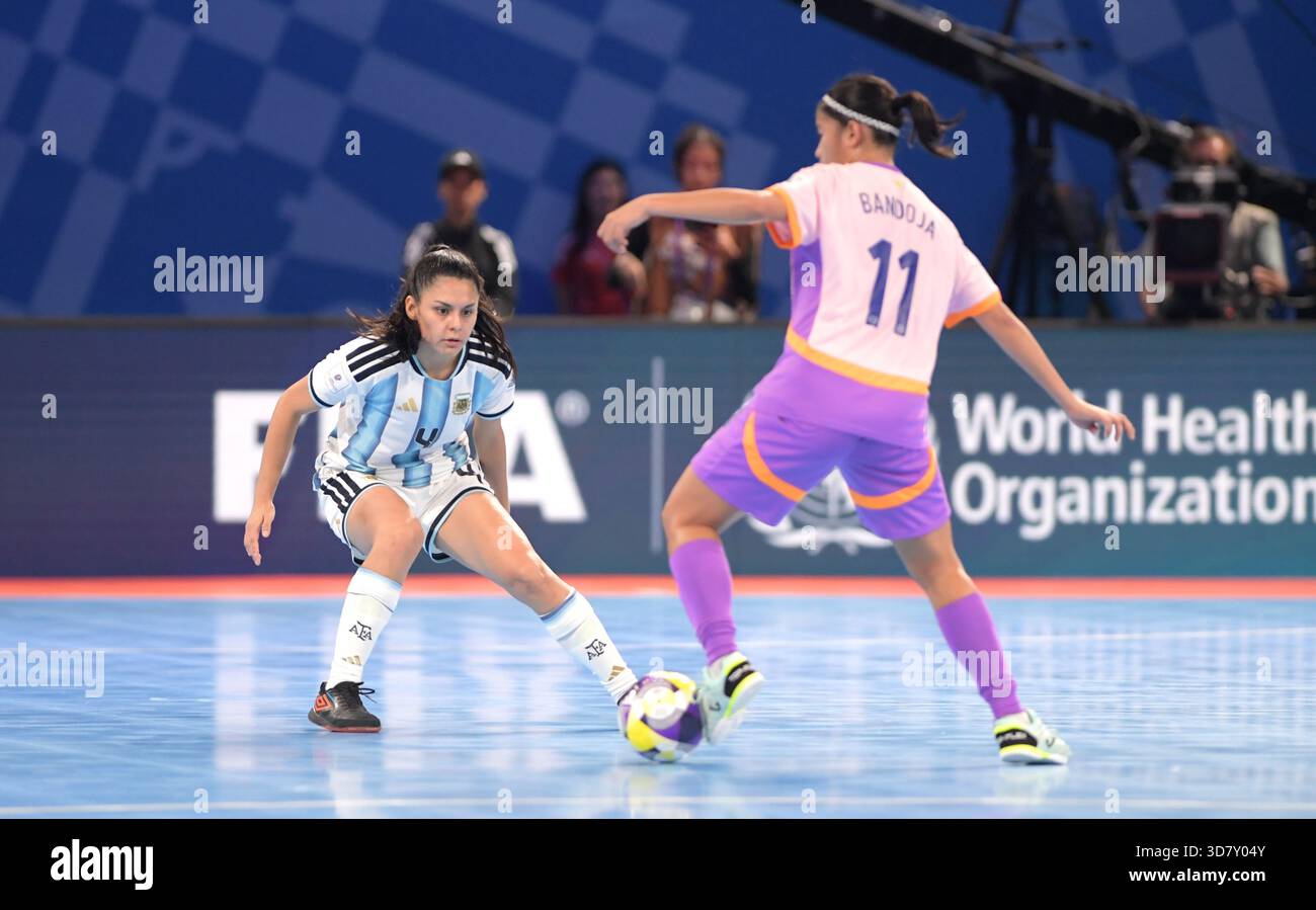 Lara Belen Villalba (L) of Argentina Women Futsal team look on as ...