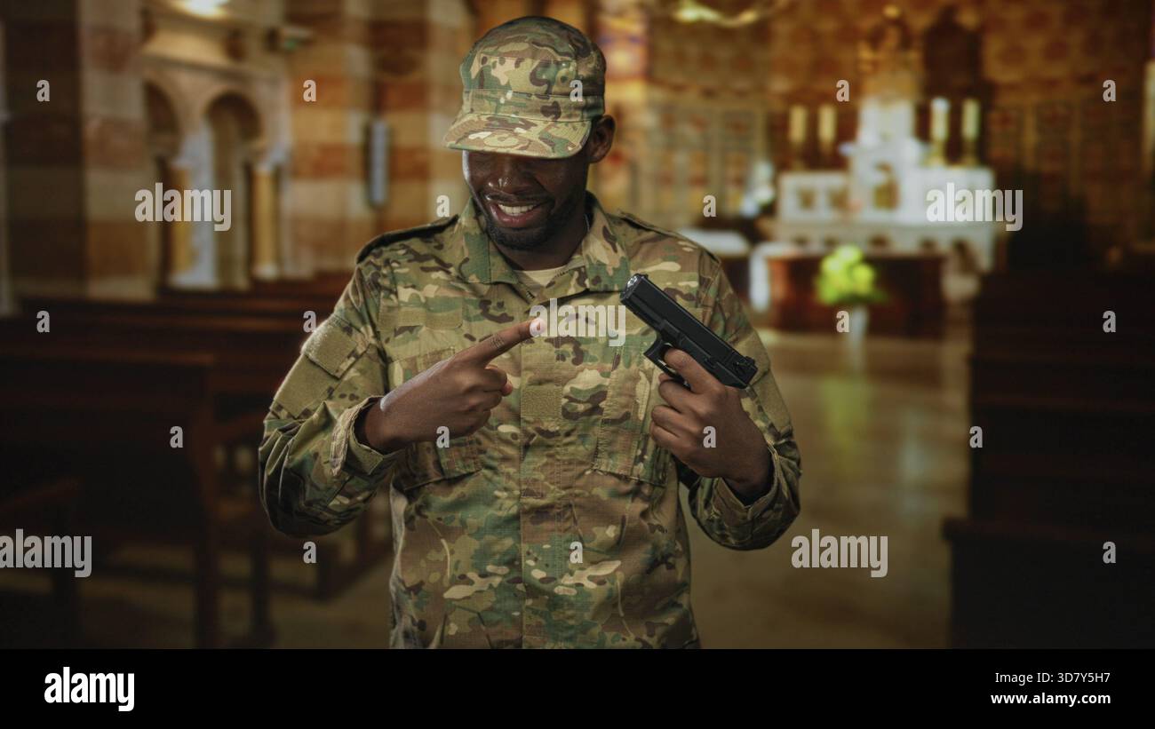 Man soldier points finger at gun while smiling inside a church building ...