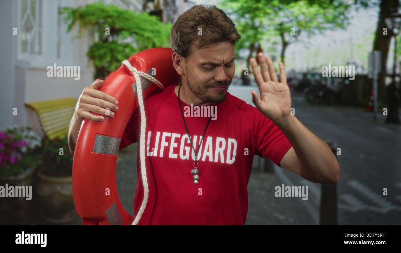 Man lifeguard holding lifebuoy whistle hi-res stock photography and ...