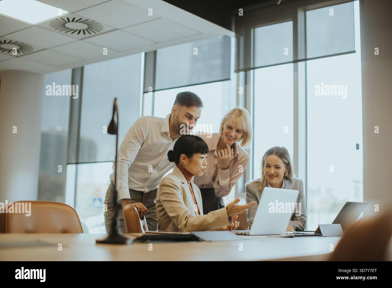 Four professionals gathered in hi-res stock photography and images - Alamy