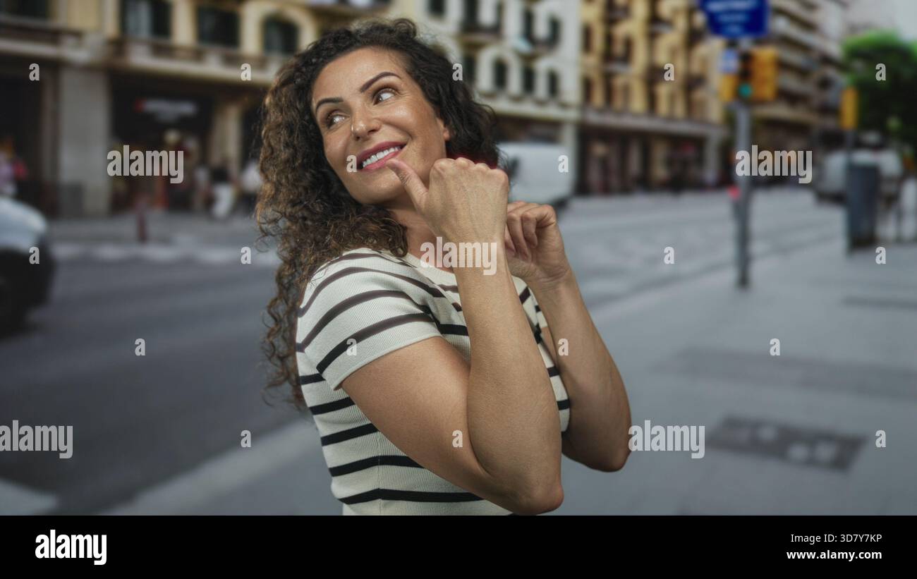 Woman glances over shoulder thumb hi-res stock photography and images ...