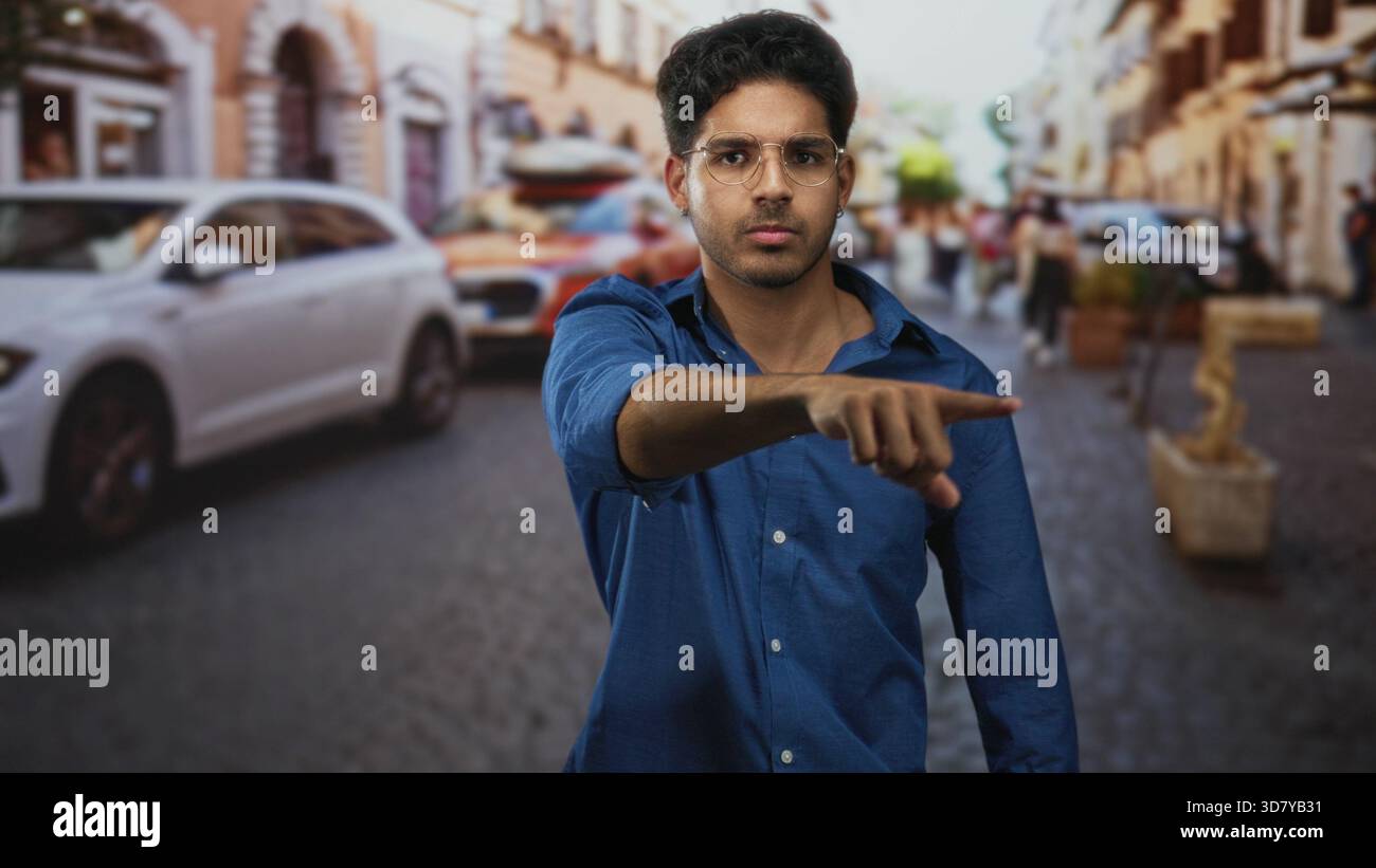 Man points finger parked car hi-res stock photography and images - Alamy
