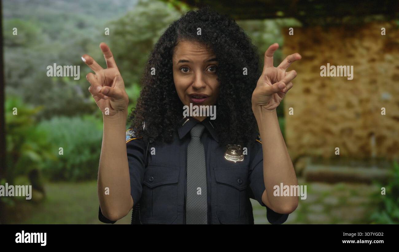 Woman police officer displays air hi-res stock photography and images ...