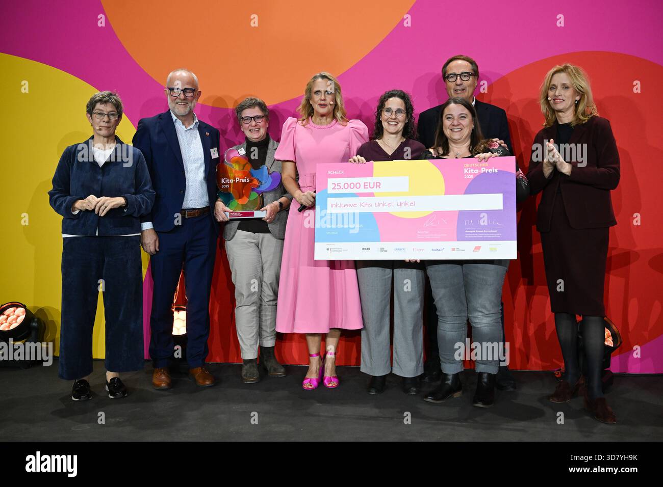 27 November 2025, Berlin: Presenter Barbara Schöneberger (M) stands ...