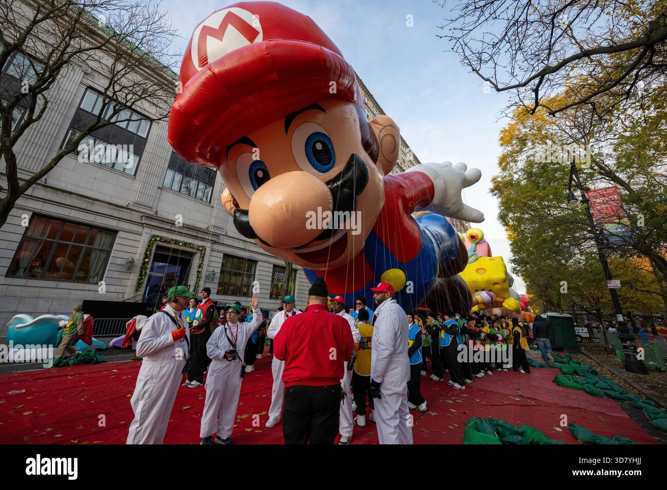 Performers march in the Macy's Thanksgiving Day Parade on November 27 ...
