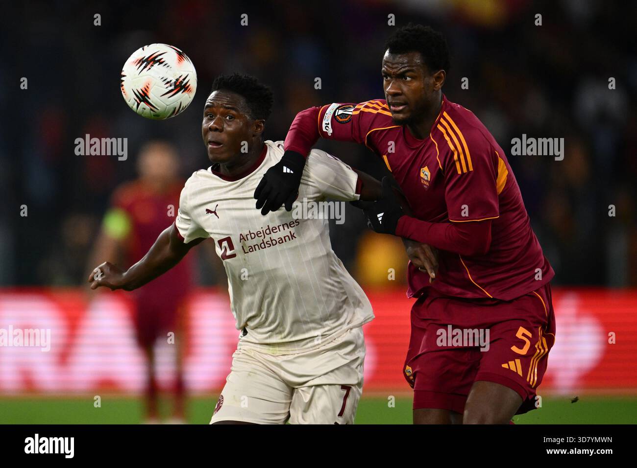 Franculino Dju of F.C. Midtjylland and Evan N'Dicka of A.S. Roma are in ...