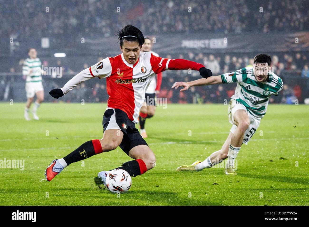 ROTTERDAM - Ayase Ueda of Feyenoord and Colby Donovan of Celtic FC ...