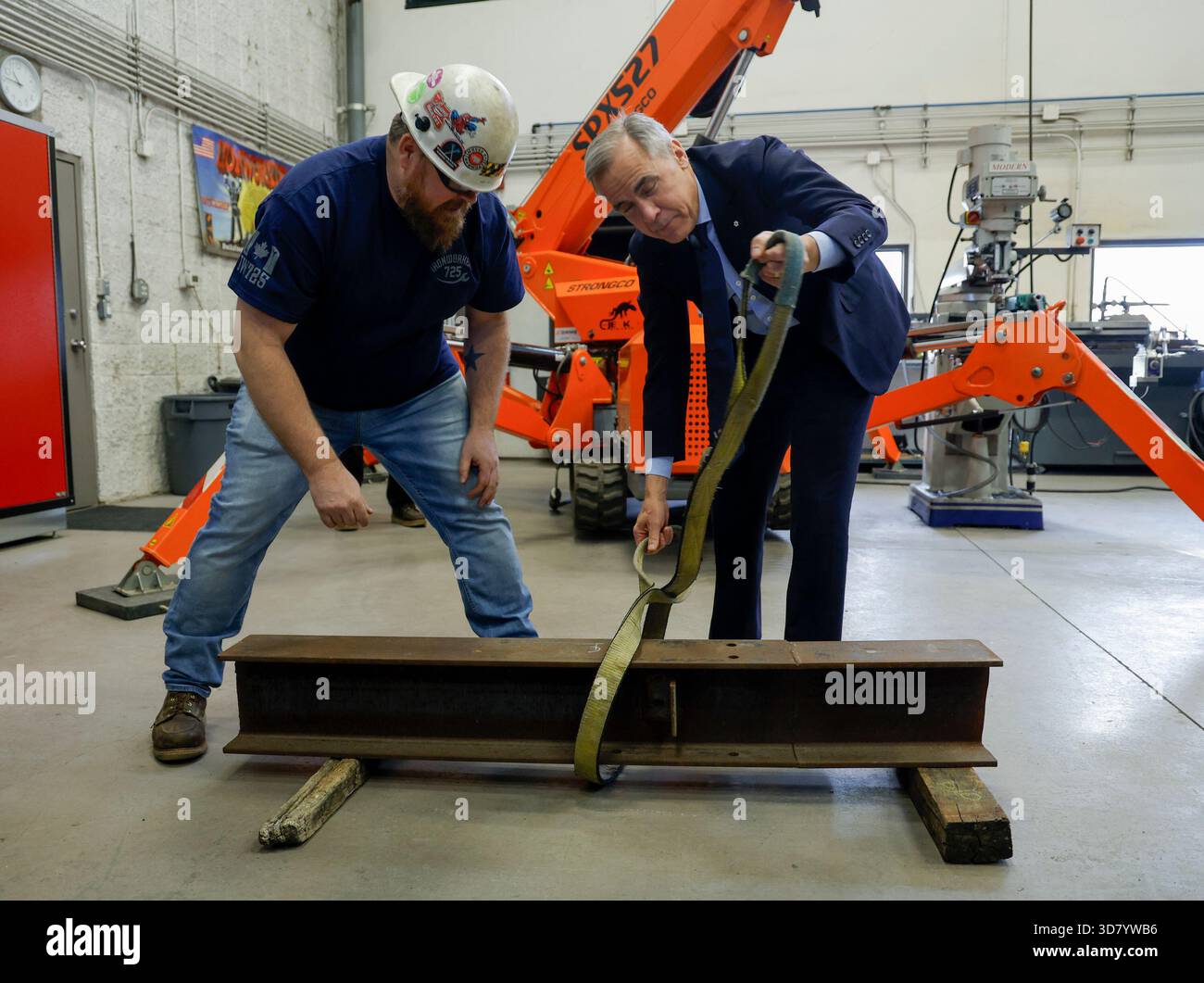 Prime Minister Mark Carney meets with ironworkers in Calgary, Alta ...