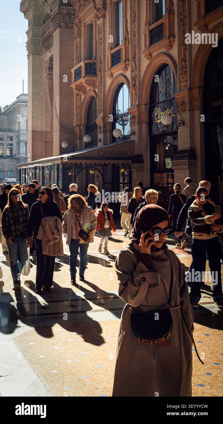 “Crowd of people walking inside the historic Galleria Vittorio Emanuele ...