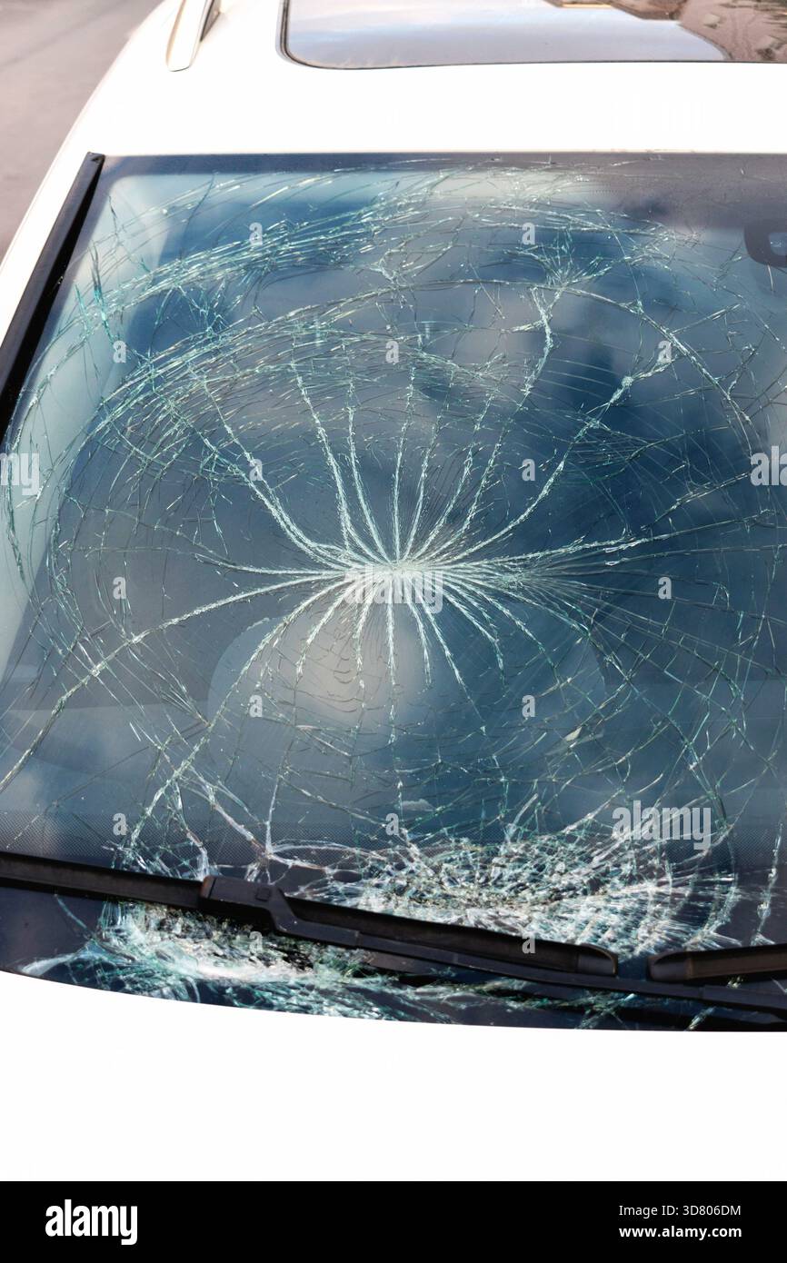 Broken glass panel in parking lot. Car window broken Stock Photo - Alamy