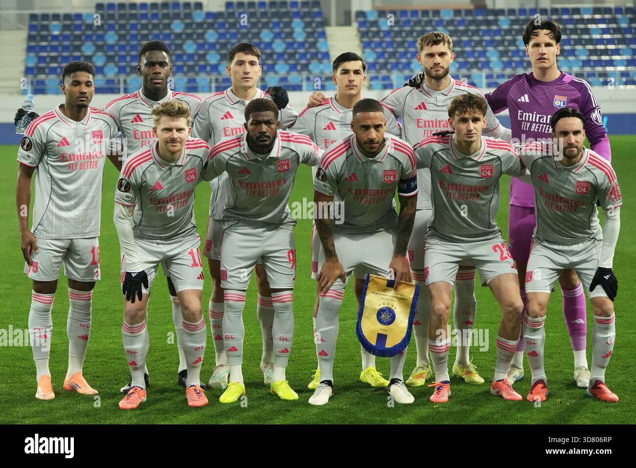 Lyon players pose ahead of the Europa League opening phase soccer match ...