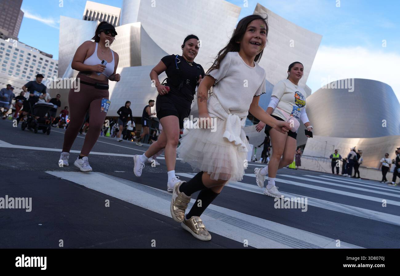 People run the Turkey Trot LA 2025, a fundraiser race for The Midnight Mission on Thanksgiving ...