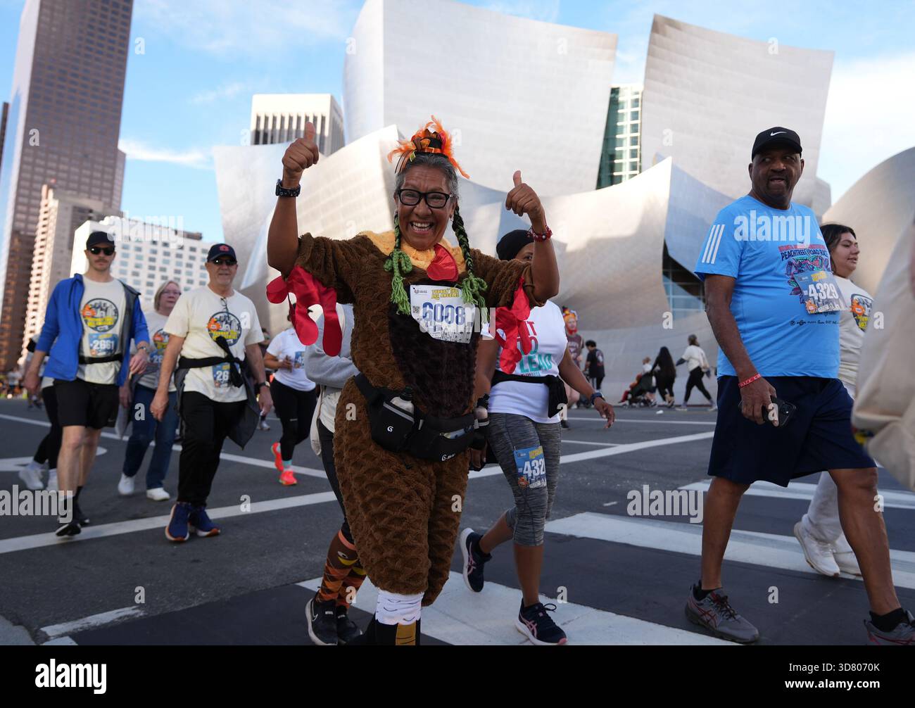 People run the Turkey Trot LA 2025, a fundraiser race for The Midnight Mission on Thanksgiving ...
