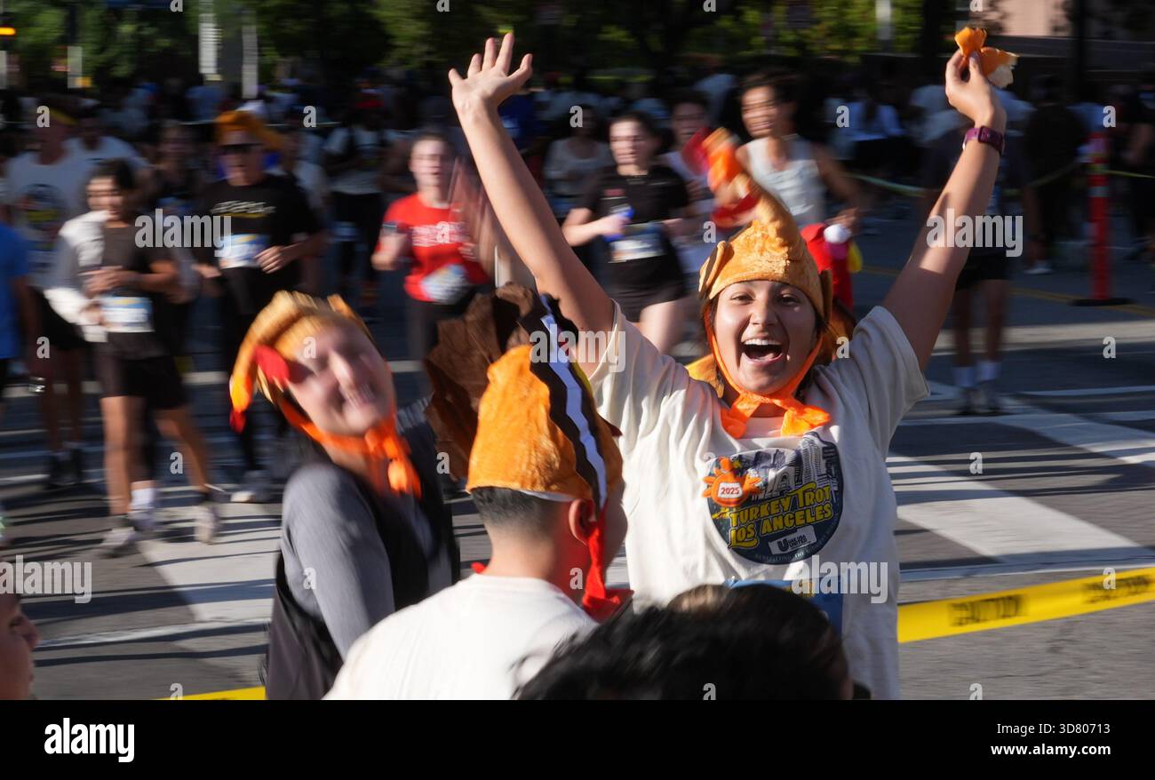 People run the Turkey Trot LA 2025, a fundraiser race for The Midnight Mission on Thanksgiving ...