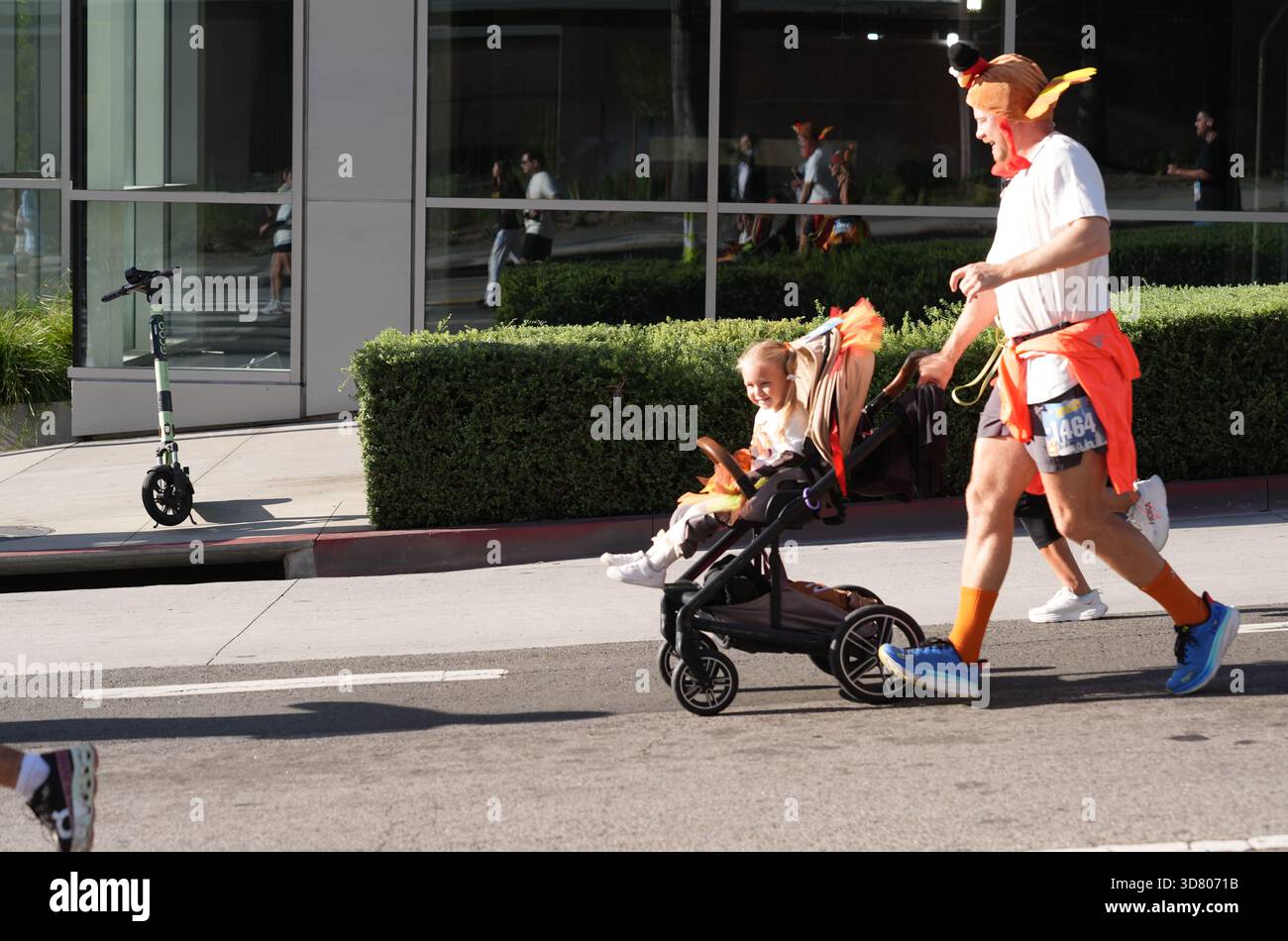 People run the Turkey Trot LA 2025, a fundraiser race for The Midnight ...
