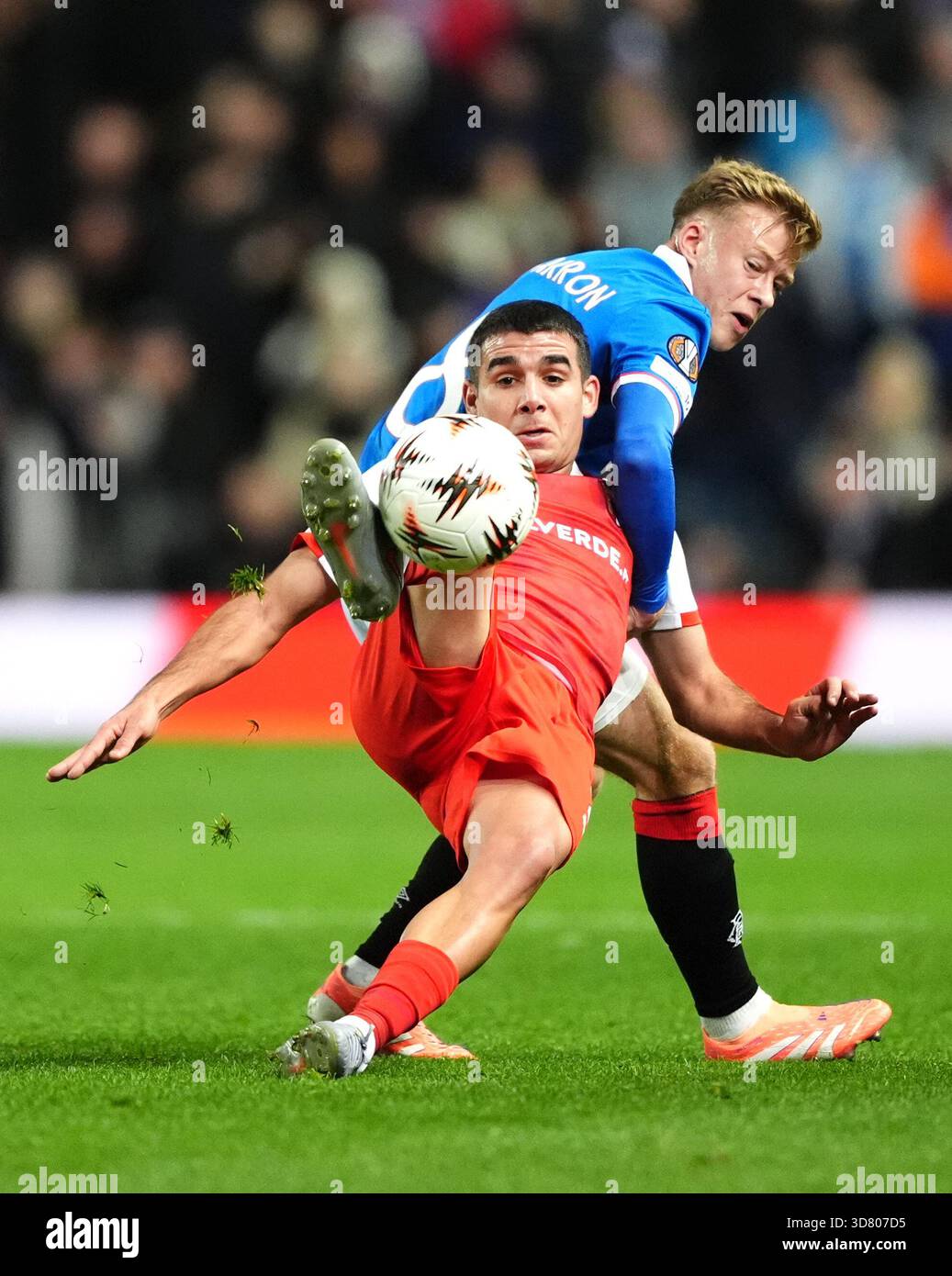 Sporting Braga's Victor Gomez and Rangers' Connor Barron battle for the ...