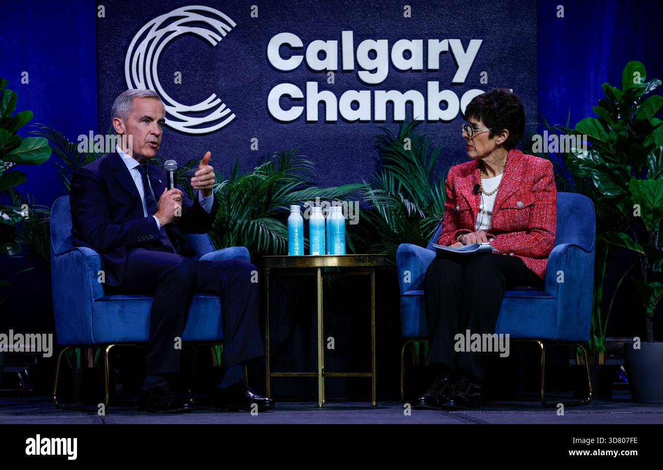 Prime Minister Mark Carney, left, speaks with Calgary Chamber of ...