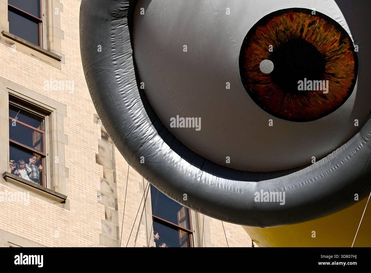 Children watch the Stuart the Minion pass by their Central Park West ...