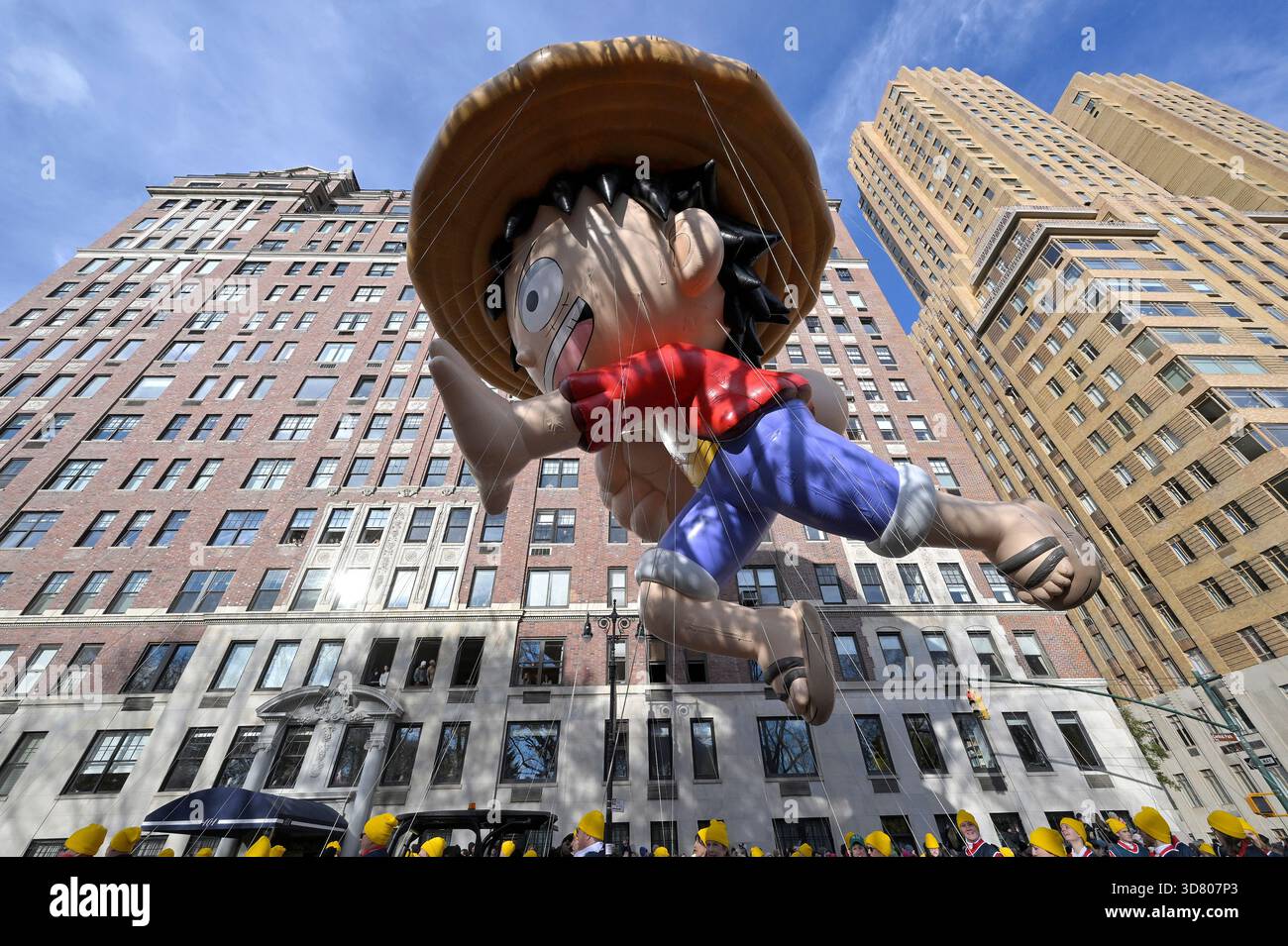 The Monkey D. Luffy balloon makes its way down Central Park West during ...