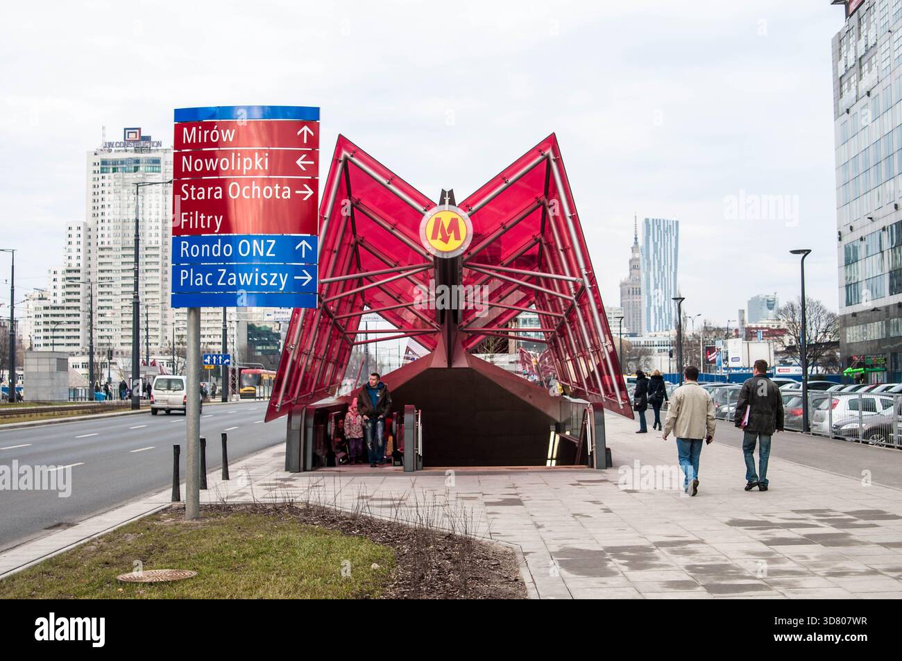 Red glass entrance to Rondo ONZ station of Warsaw Metro M2 line on ...