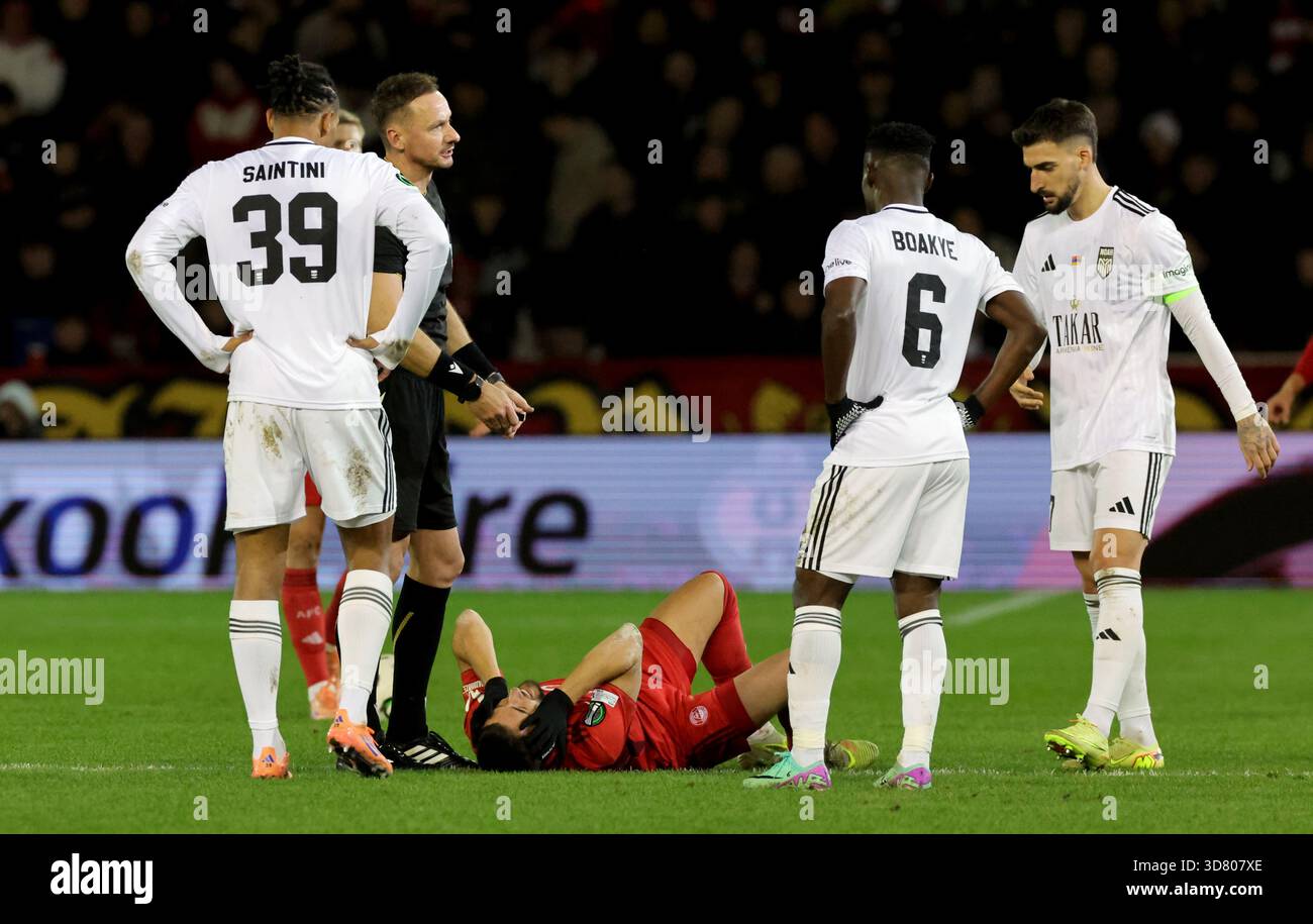Aberdeen's Adil Aouchiche reacts after a head injury during the UEFA ...