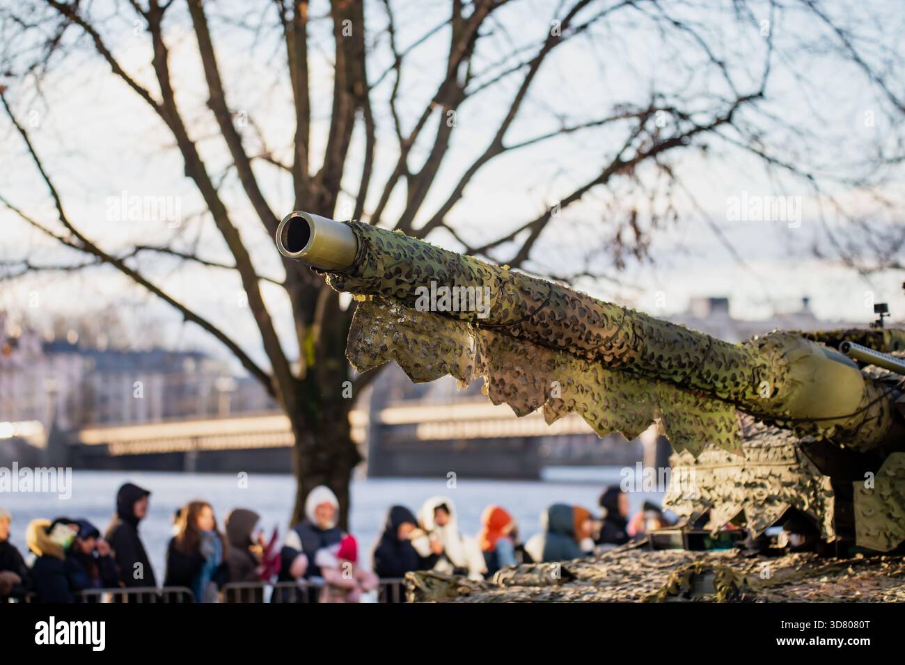 Heavily camouflaged NATO tank gun system illustrating modern armored ...