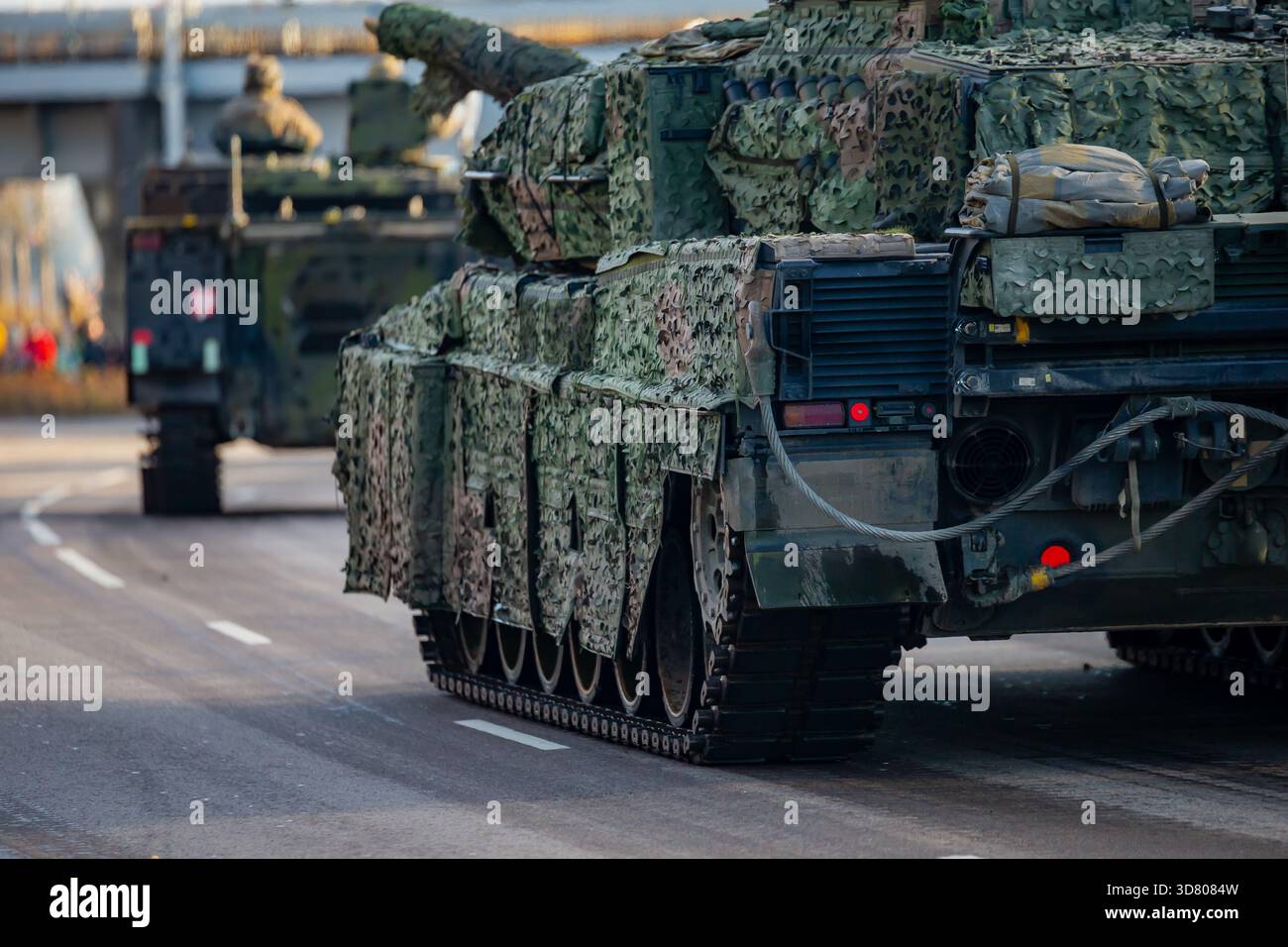 NATO main battle tank advancing in armored convoy, demonstrating ...