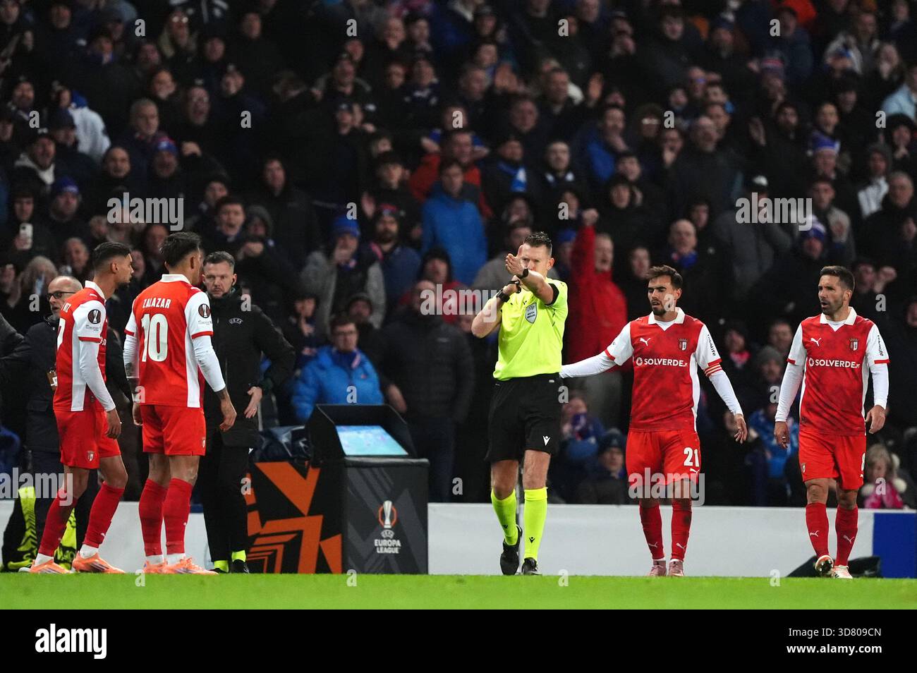 Referee Allard Lindhout performs a VAR check during the UEFA Europa ...