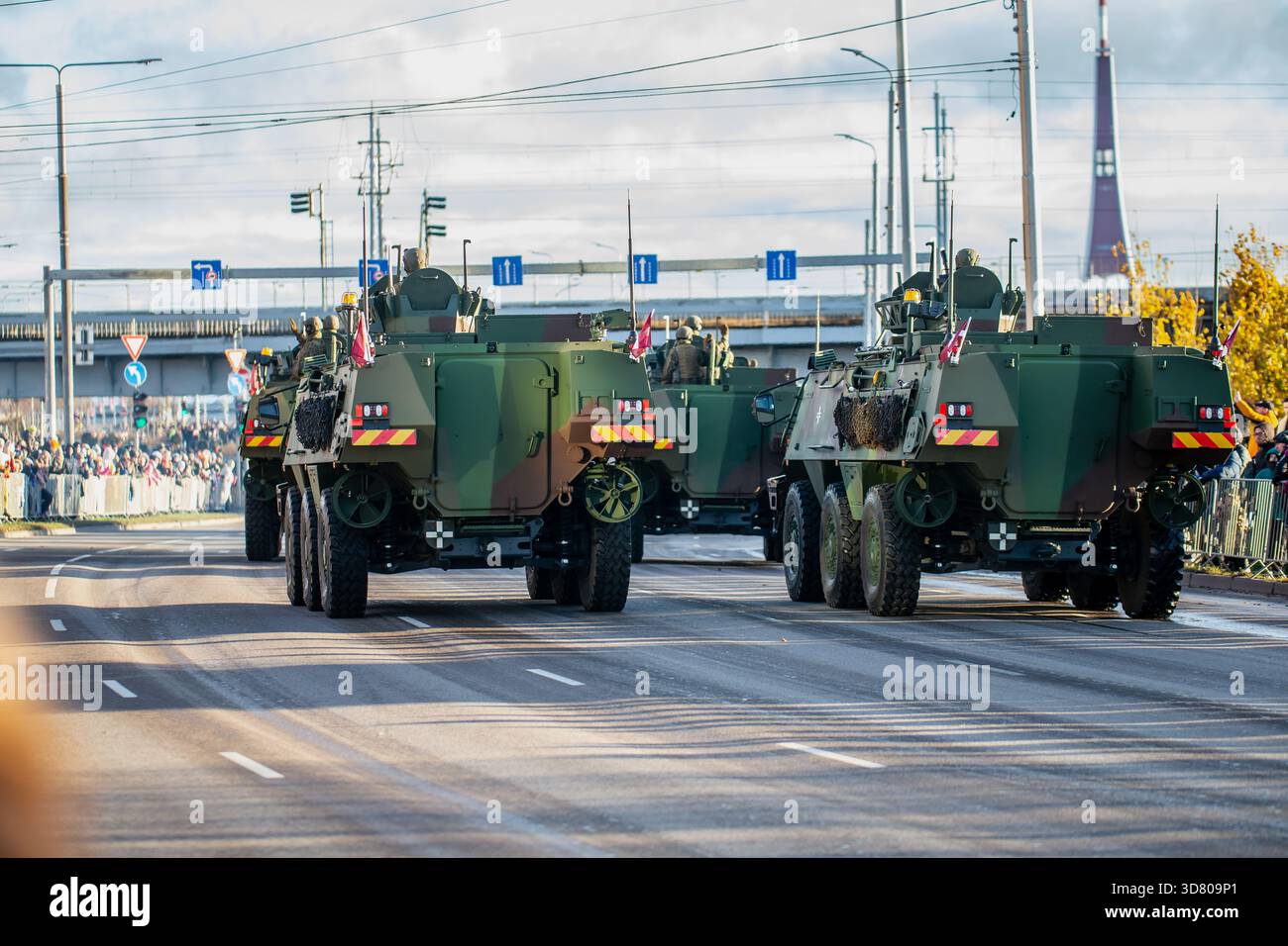 NATO allied armored transport convoy with soldiers, camouflage surfaces ...