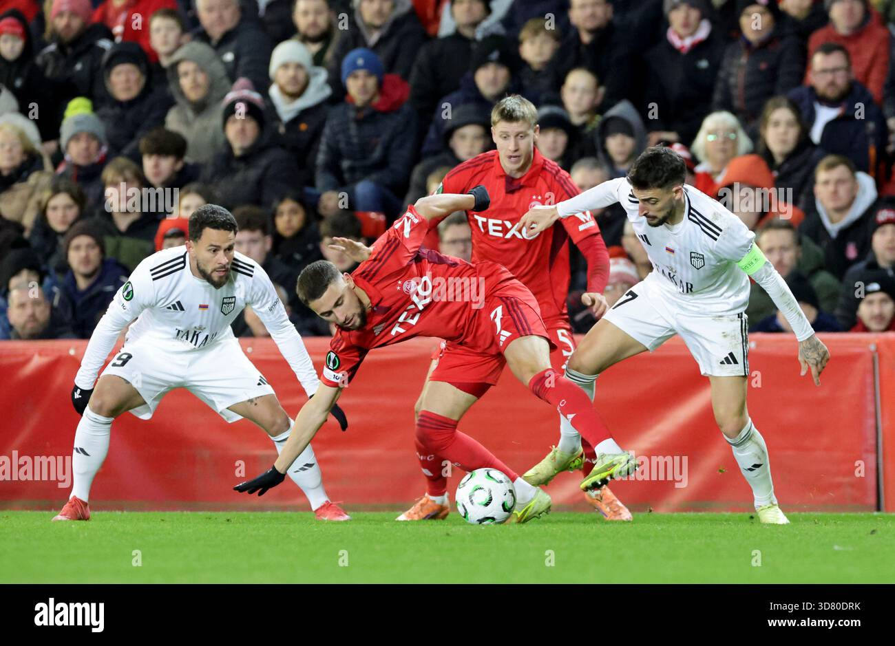 Aberdeen's Adil Aouchiche (centre) and Noah's Helder Ferreira (right ...
