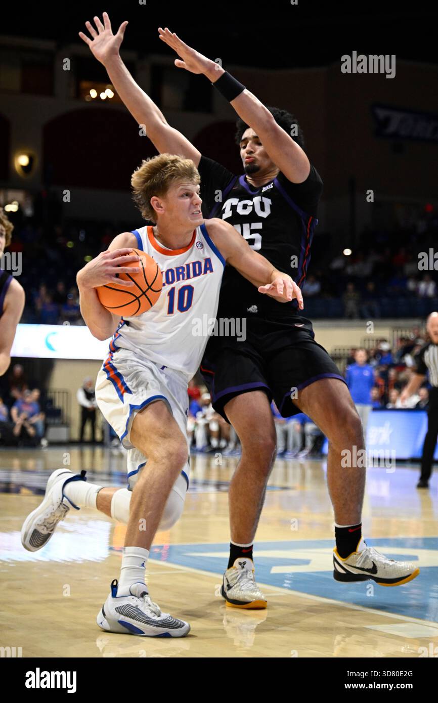 Florida forward Thomas Haugh (10) drives past TCU forward David Punch ...