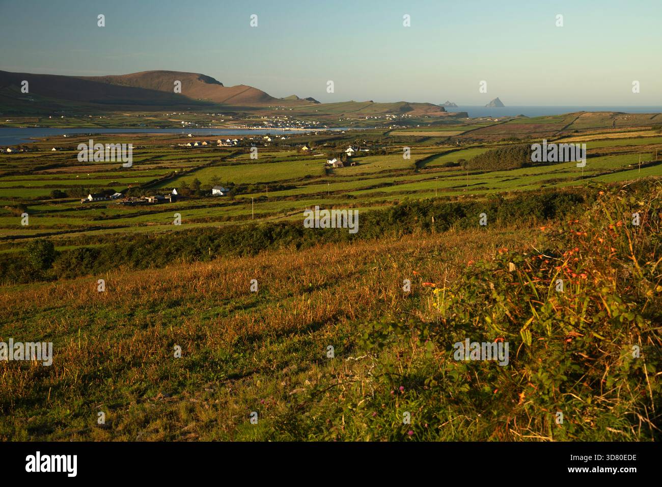 View towards Portmagee village and the Skelligs from Valentia island in ...