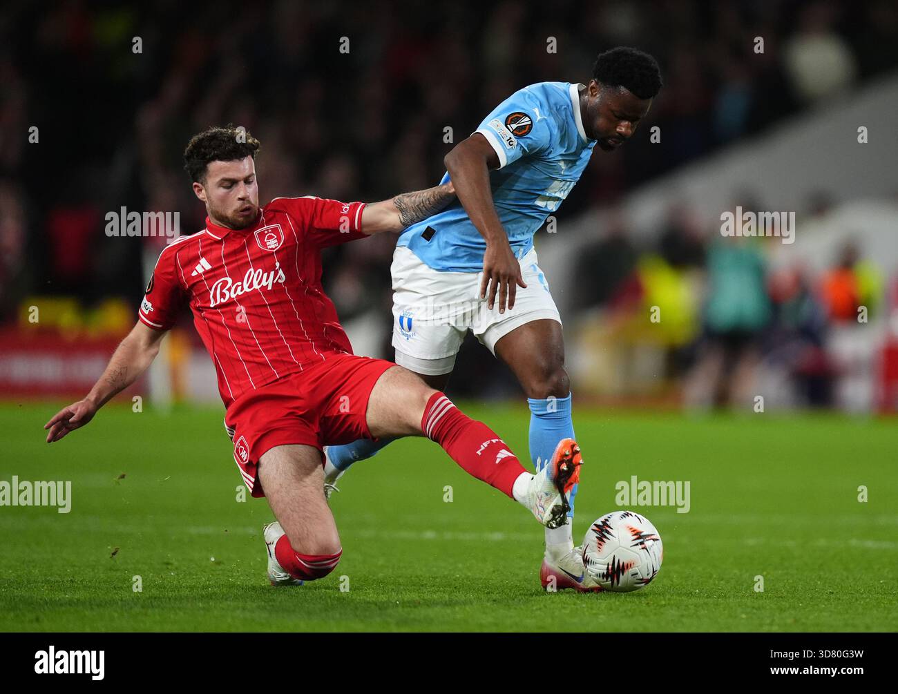 Nottingham Forest's Neco Williams (left) challenges Malmo's Emmanuel ...
