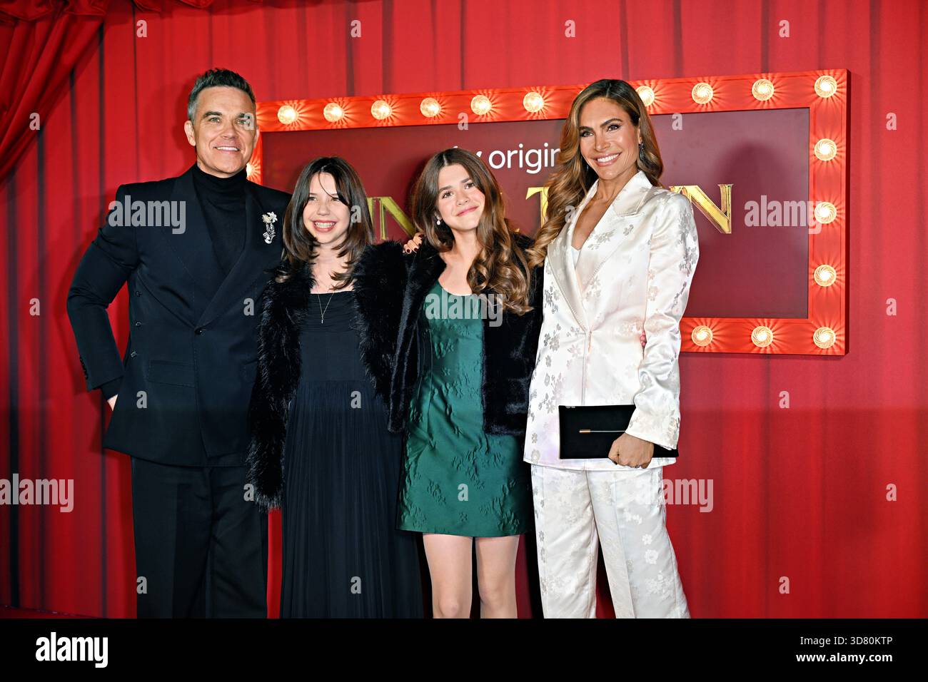 London, England, 26 November 2025: Robbie Williams, Teddy Williams ...