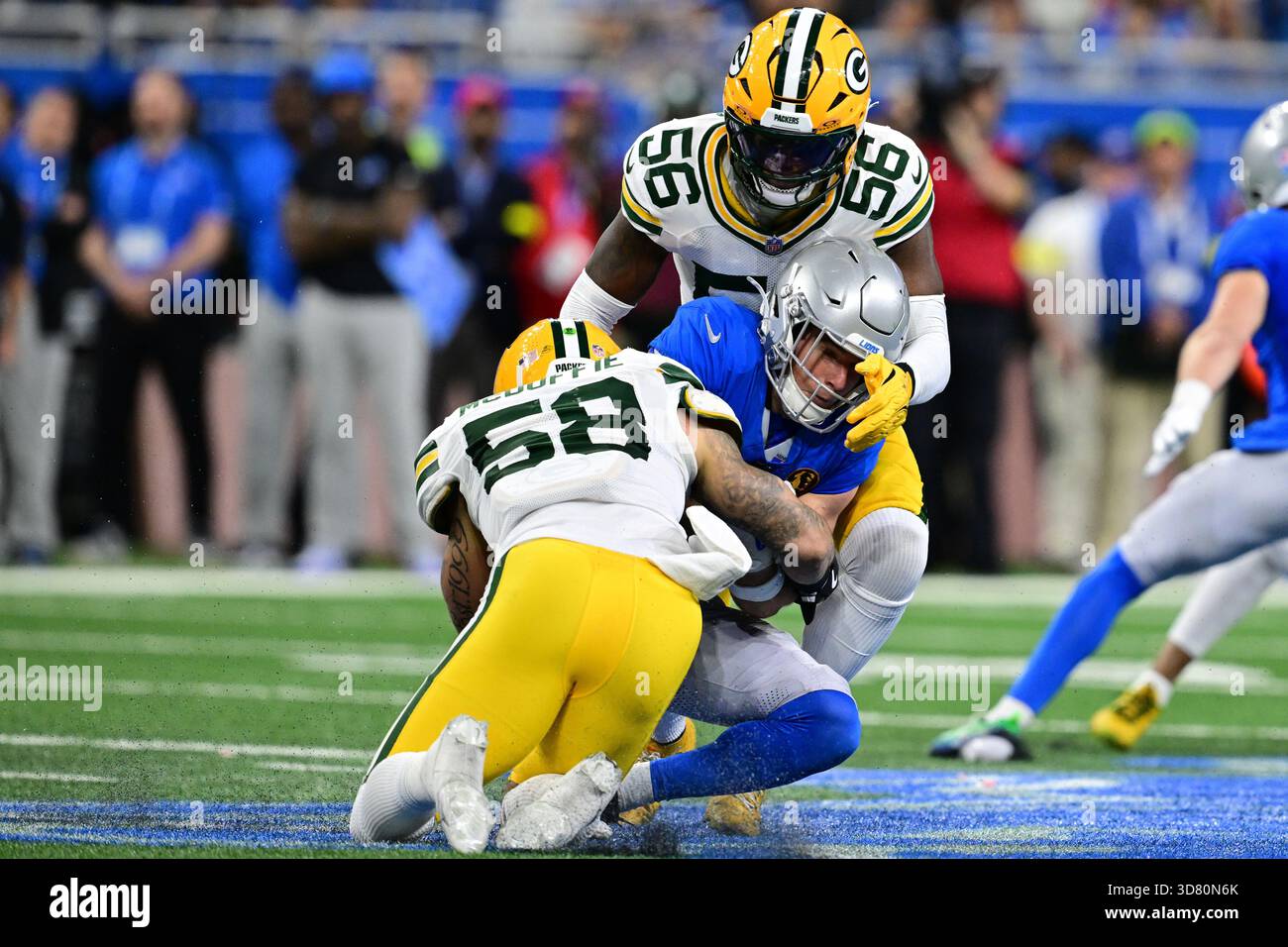 Detroit Lions wide receiver Tom Kennedy is tackled by Green Bay Packers ...