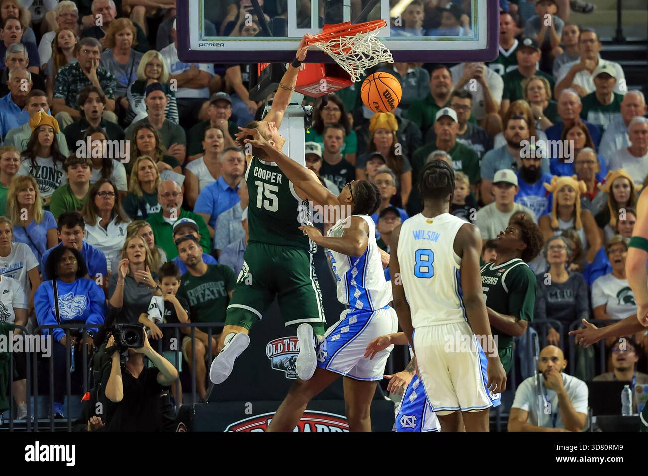 Michigan State center Carson Cooper (15) dunks against North Carolina ...
