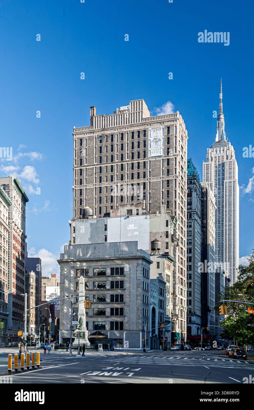 Midtown Manhattan showcases the iconic Empire State Building rising ...
