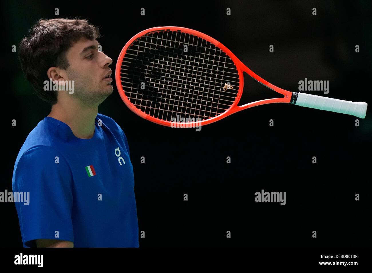 FILE - Italy's Flavio Cobolli throws his racket during a Davis Cup singles semifinal match ...