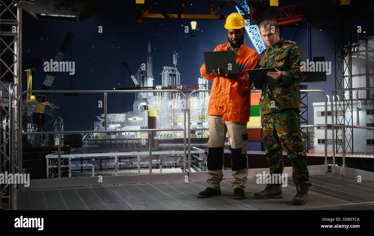 Professional military operative communicates via radio on offshore ...