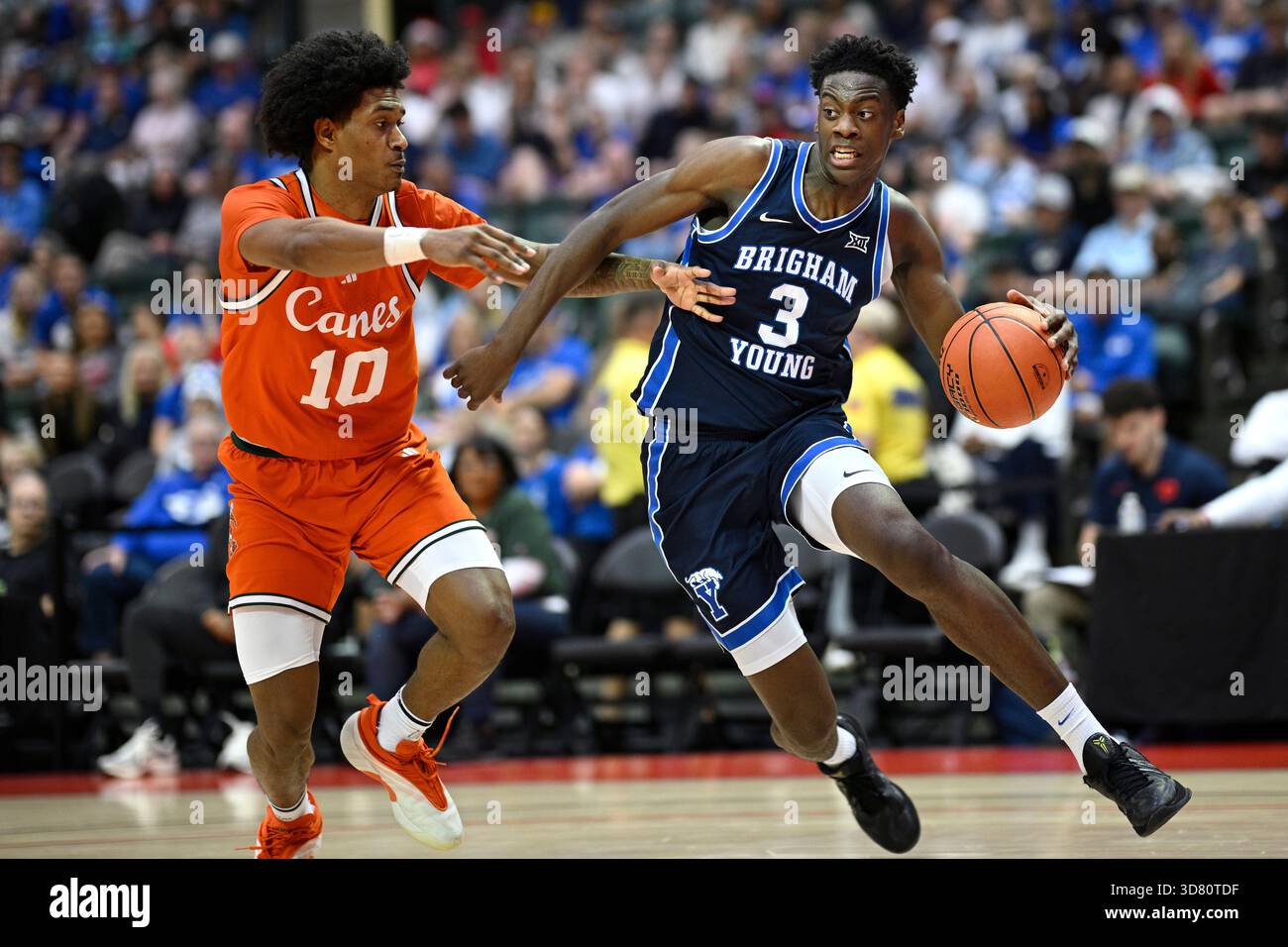 BYU forward AJ Dybantsa (3) drives against Miami guard Tru Washington ...